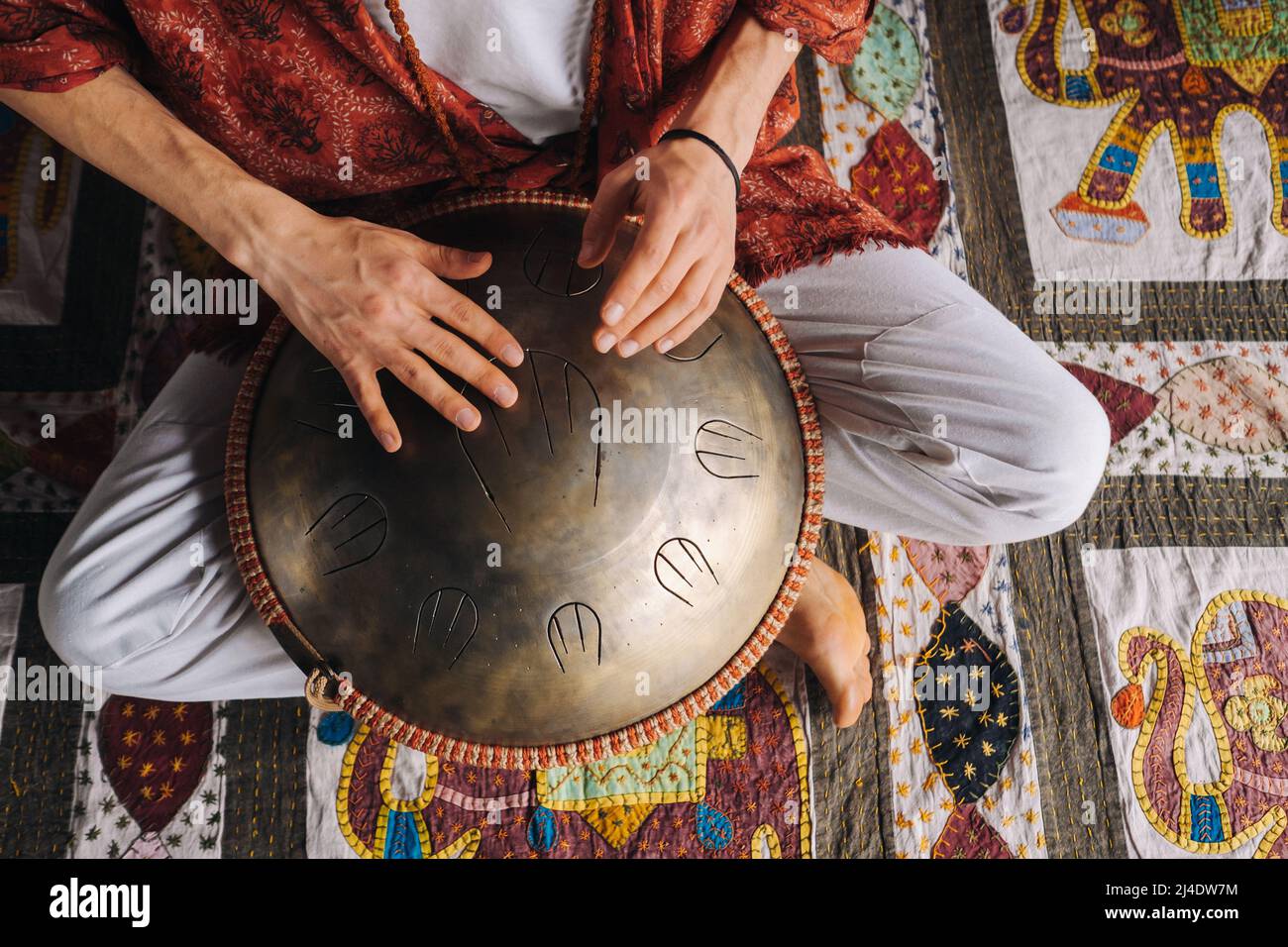 Close-up of a man's hand playing a modern musical instrument, the orion ...