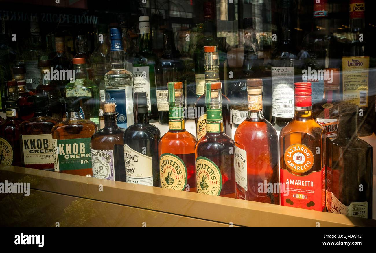 A collection of liquor on display in the window of a restaurant in New ...