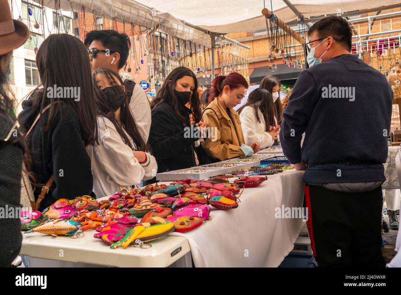 Crowds of shoppers at a street fair in Chelsea in New York Saturday ...