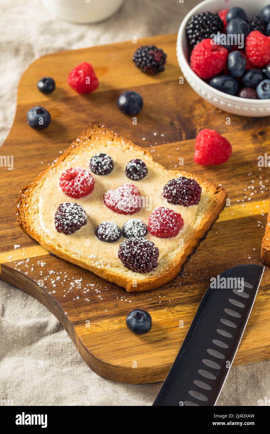 Homemade Trendy Custard Yogurt Toast with Berries Stock Photo - Alamy