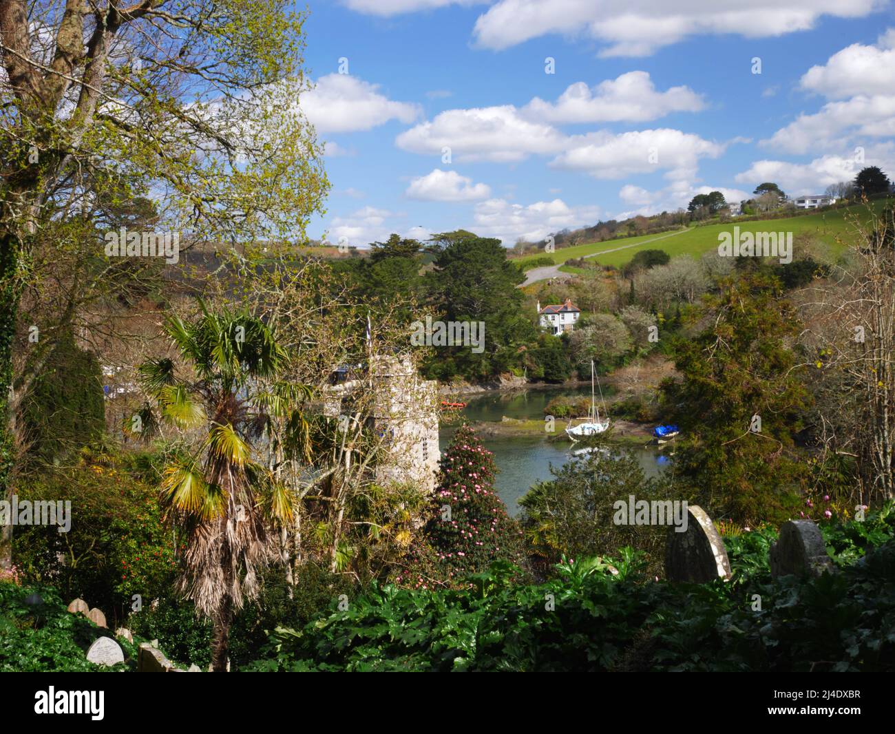 The church of St Just-in-Roseland, Cornwall, with St Just creek beyond ...