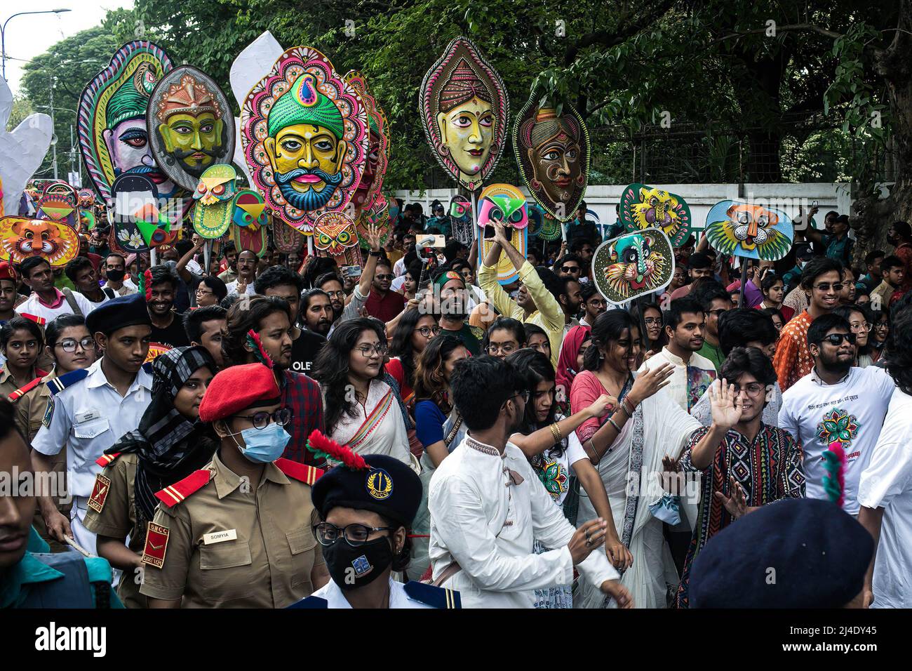 Dhaka, Bangladesh. 14th Apr, 2022. People carry masks during a rally to ...