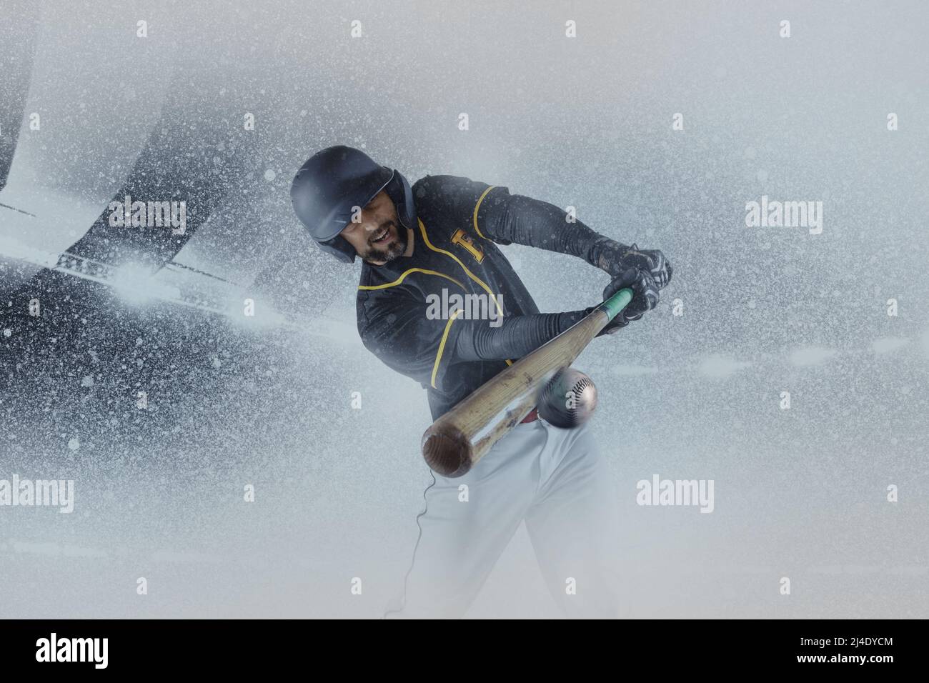 One professional baseball player in sports equipment training alone ...