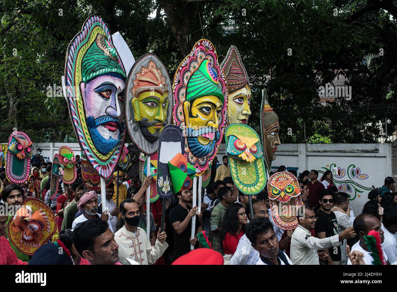 Dhaka, Bangladesh. 14th Apr, 2022. People carry masks during a rally to ...