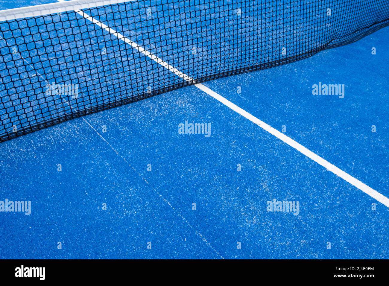 blue paddle tennis court, net view Stock Photo - Alamy