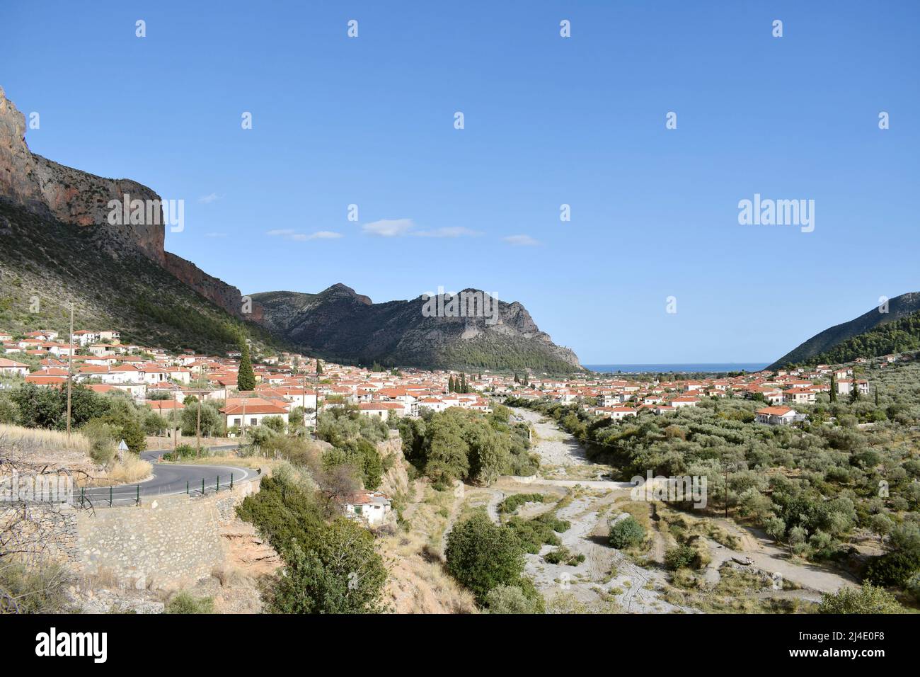 View of Leonidio (traditional greek village) with blue sky and ...