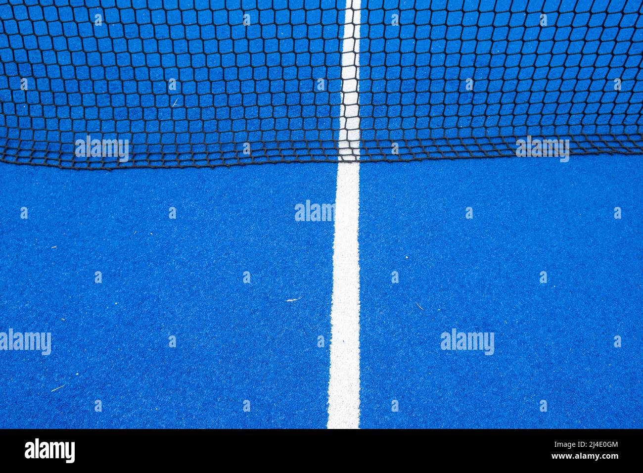 blue paddle tennis court, net view Stock Photo - Alamy
