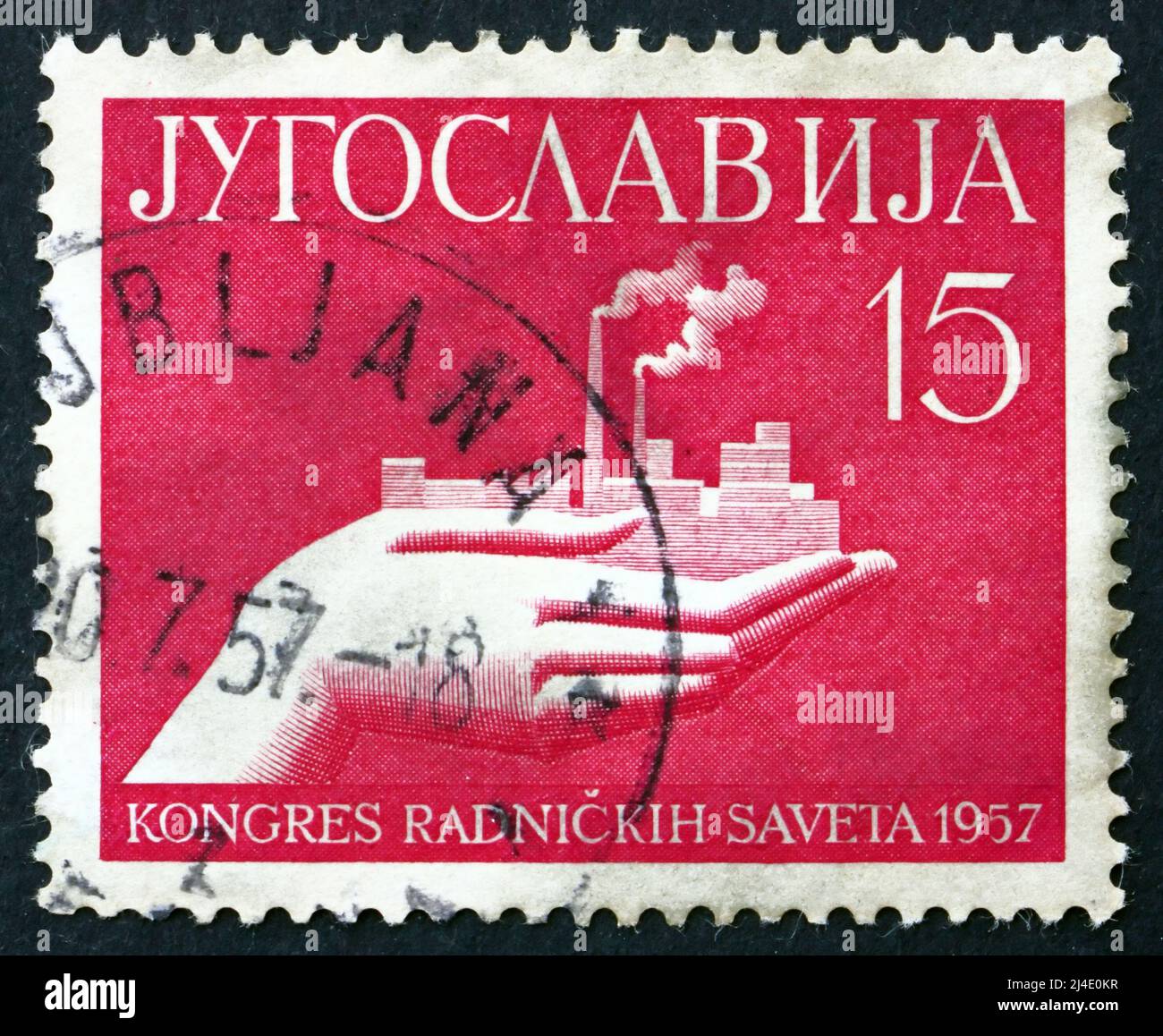 YUGOSLAVIA - CIRCA 1957: a stamp printed in the Yugoslavia shows Hand ...