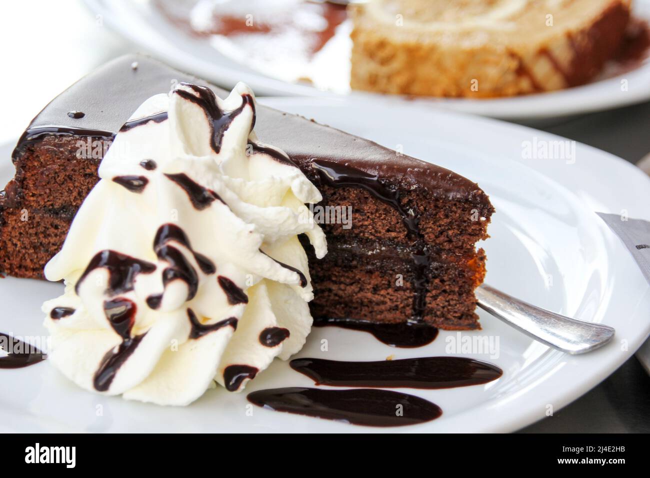 Vienna sweets specialty: Sacher Cake with decorative cream Stock Photo ...