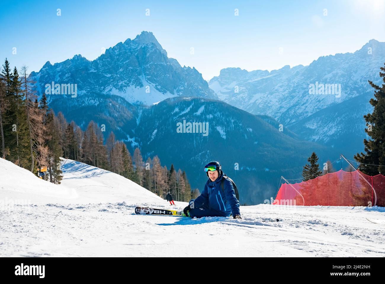 Skier sitting on snow hi-res stock photography and images - Alamy