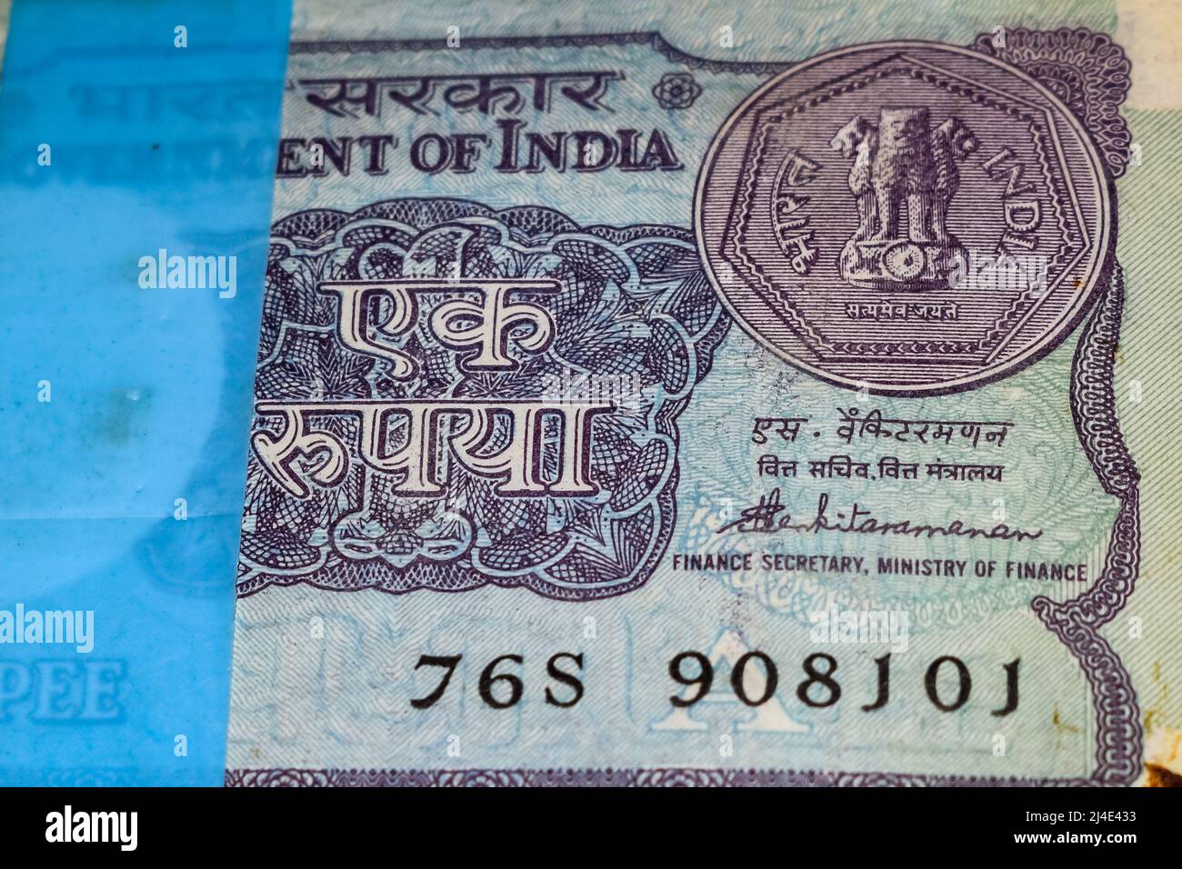 Old One Rupee notes combined on the table, India money on the rotating ...