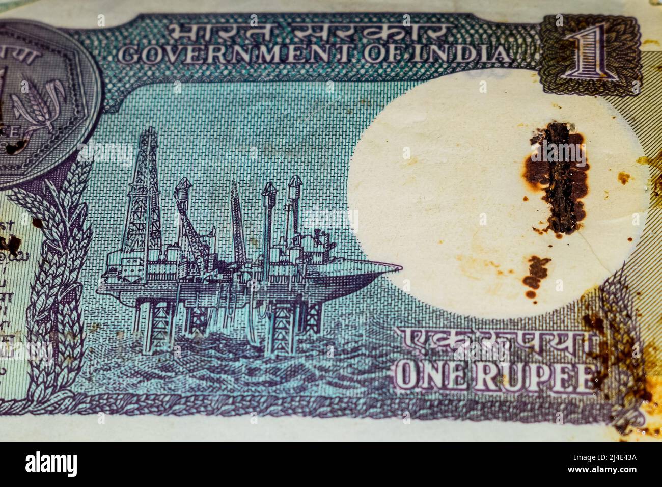 Old One Rupee notes combined on the table, India money on the rotating ...