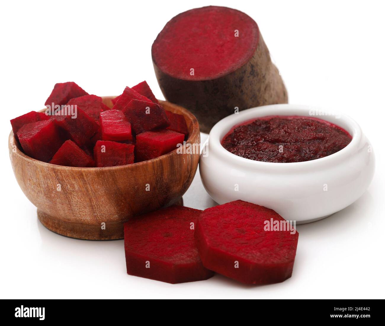 Beetroot with paste in a bowl over white background Stock Photo - Alamy