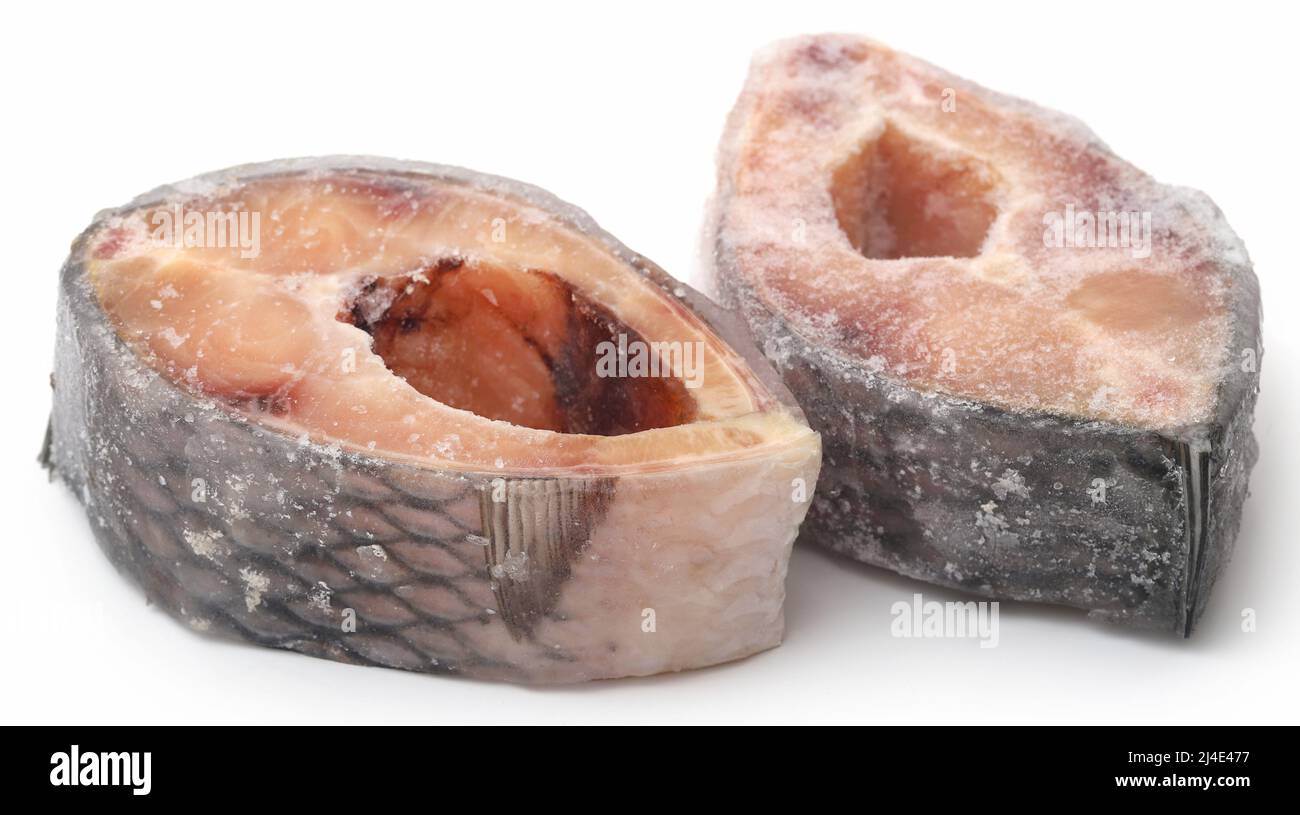 Popular rohu fish sliced and frozen over white background Stock Photo ...