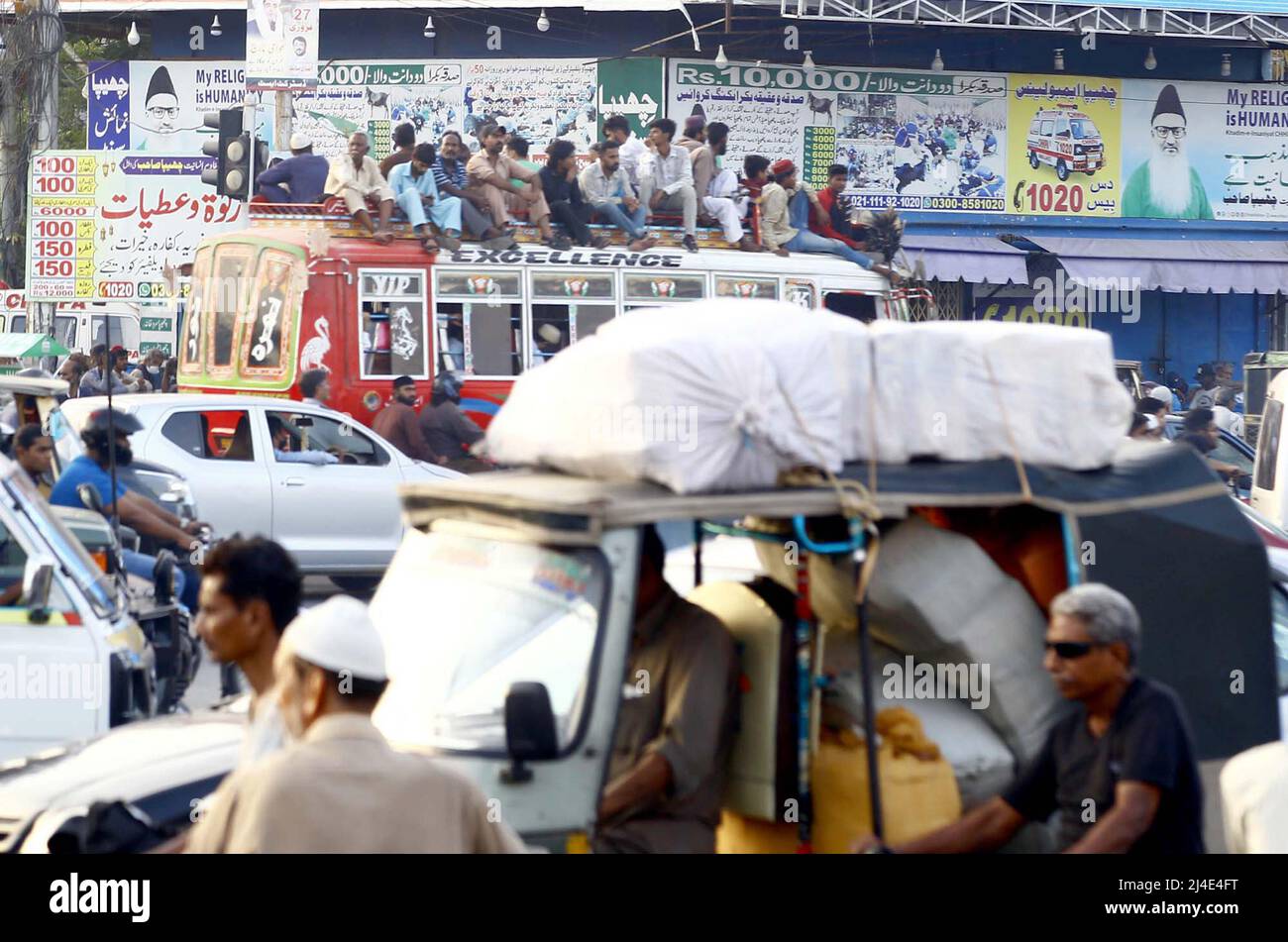 Passengers travelling on an overloaded bus as the short of public ...