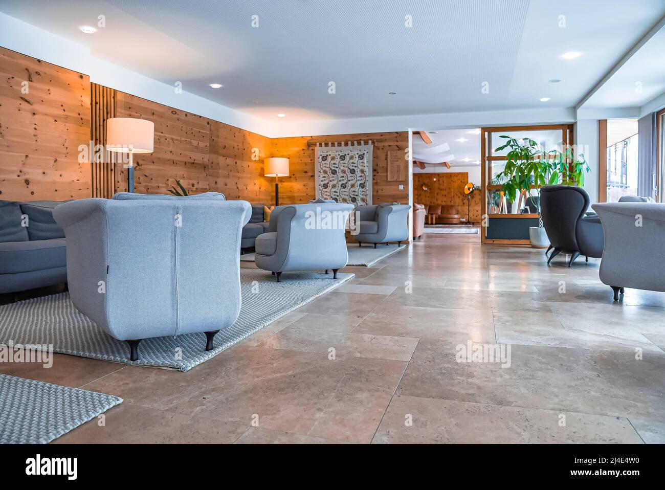 Beautiful interior of rustic style lobby at luxurious ski resort Stock ...