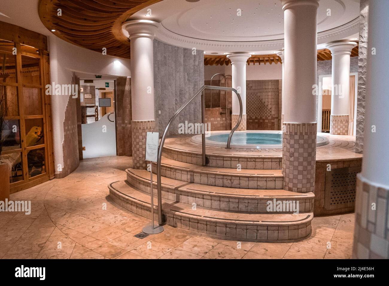 Round jacuzzi in modern bathroom with elegant style in luxurious ski ...