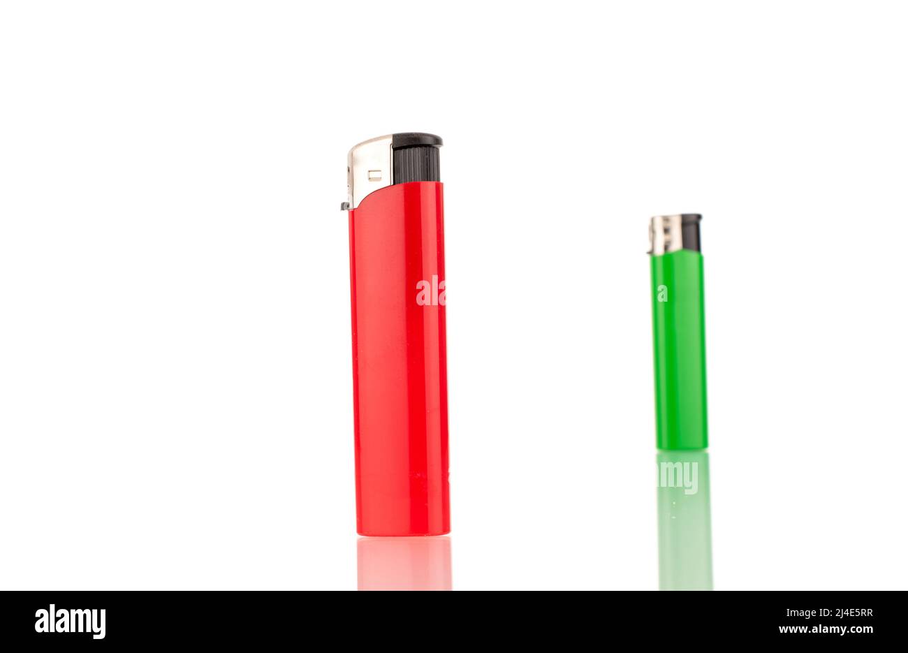 Two colored lighters, macro, isolated on a white background Stock Photo ...