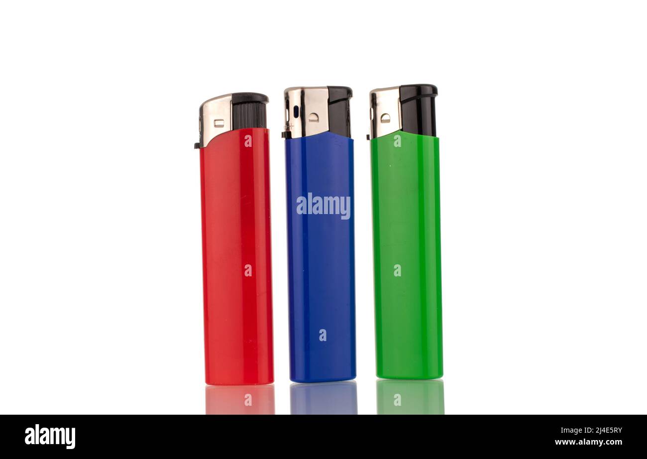 Three colored lighters, macro, isolated on a white background Stock ...