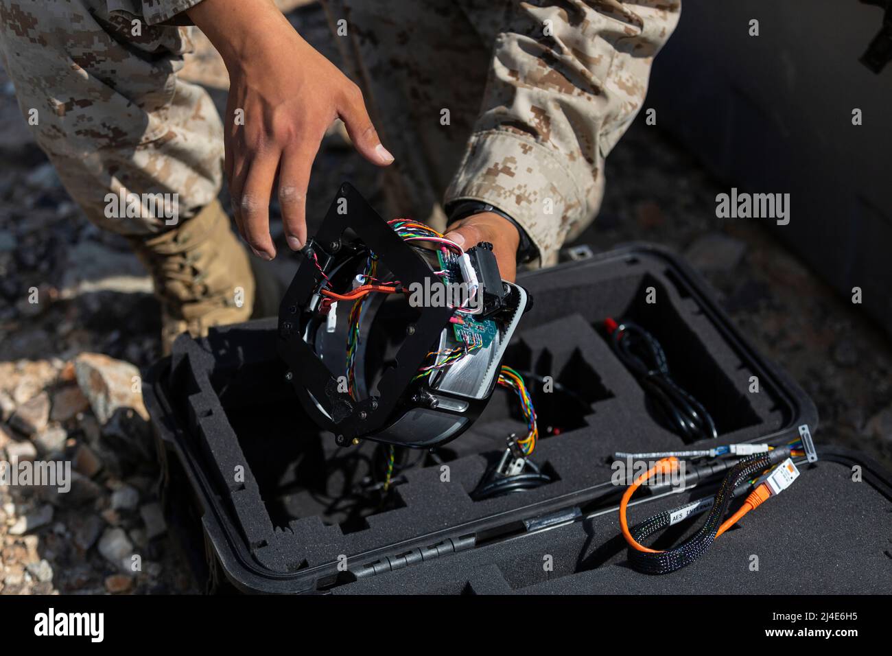 U.S. Marine Corps Lance Cpl. Adrian Miranda, an unmanned ariel system ...