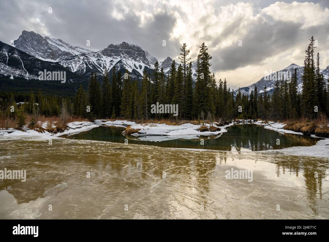 Sunrise over Policeman Creek and the Canadian Rockies at Three Sisters ...