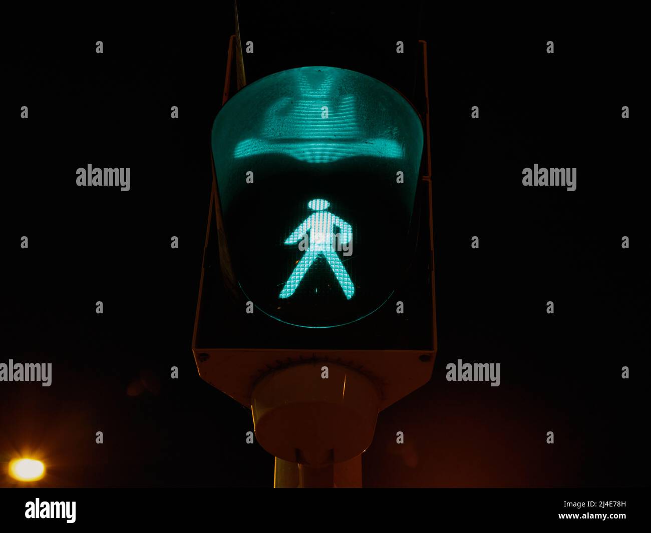 Portrait of a green stick figure at a traffic light crossing Stock ...
