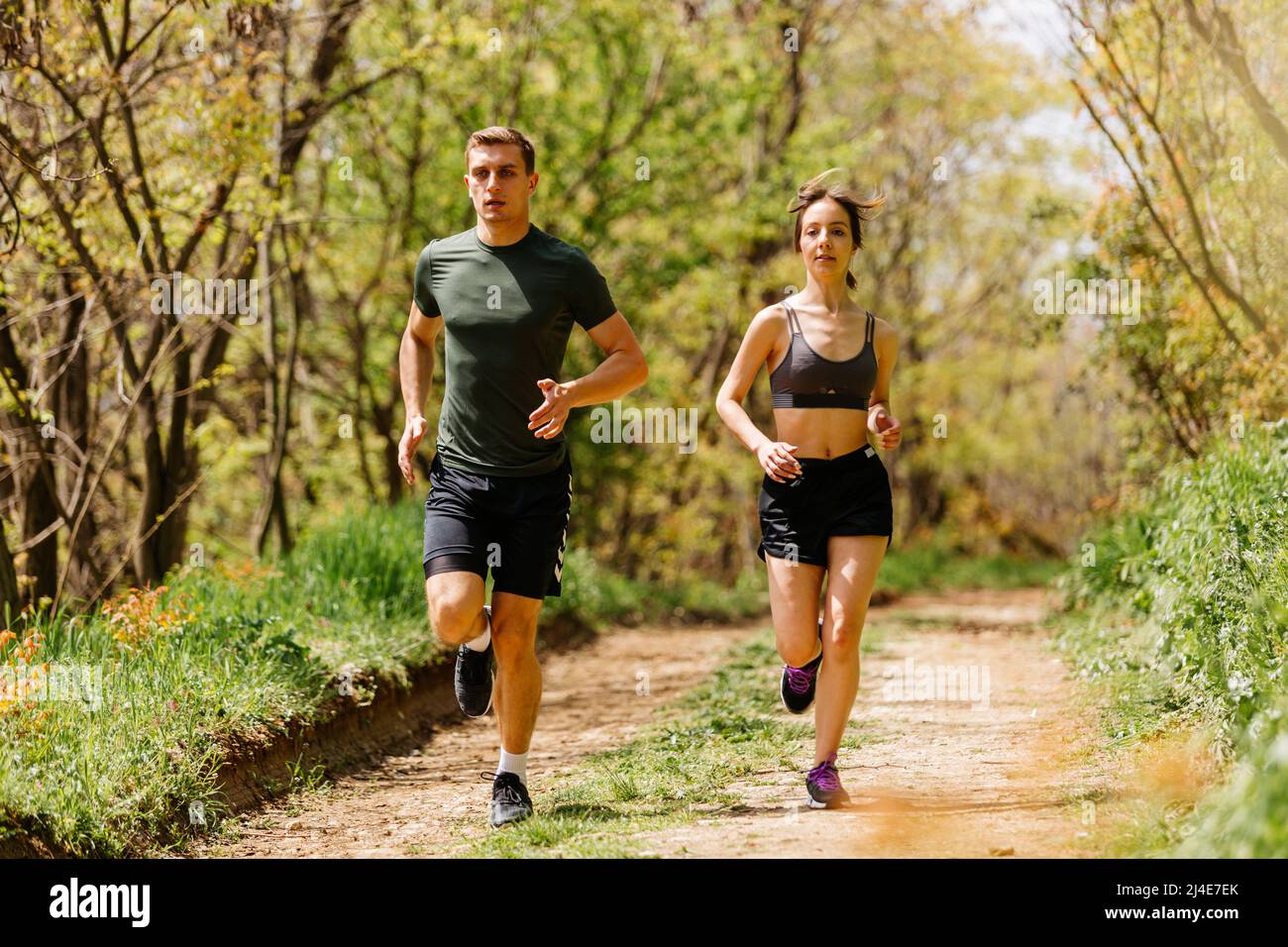 Female jogging in park slow hi-res stock photography and images - Alamy