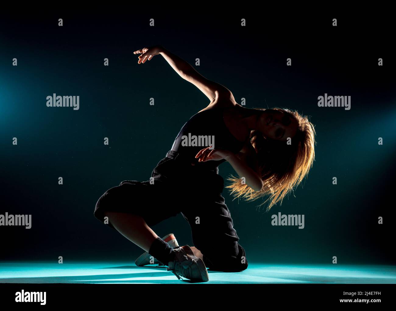 Female dance dancer exercising poses during a dance practice Stock ...
