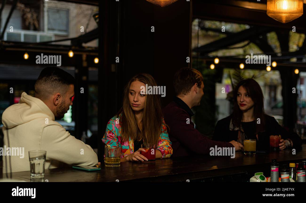 Amazing and beautiful two young couples are having a great time ...