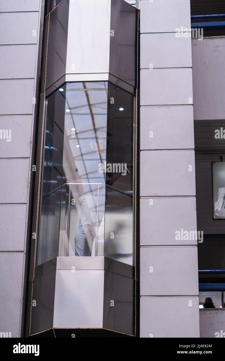 URban businessman is talking with his partners and chechking his plans ...