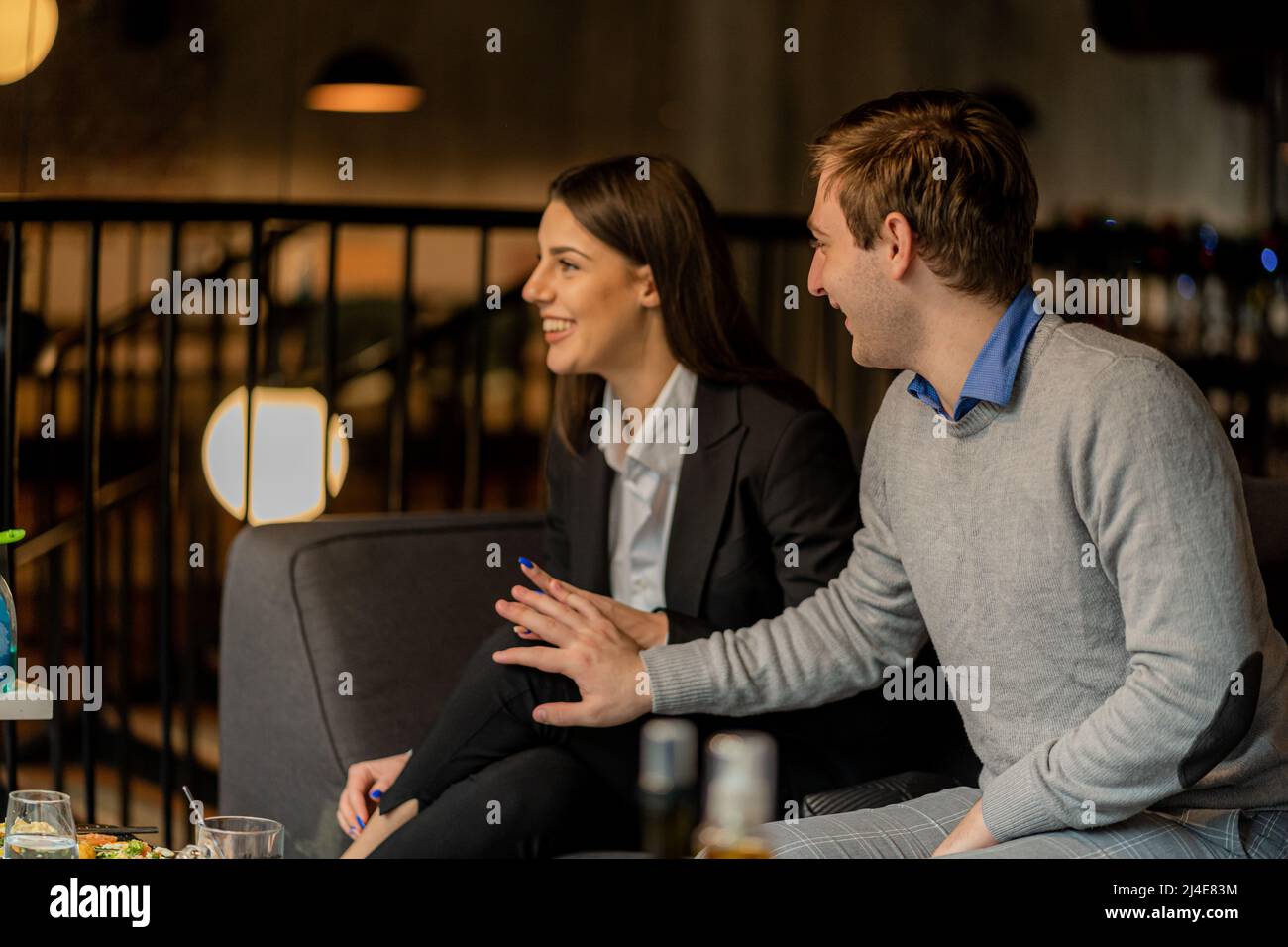 Two amazing and attractive business people are lauging Stock Photo - Alamy