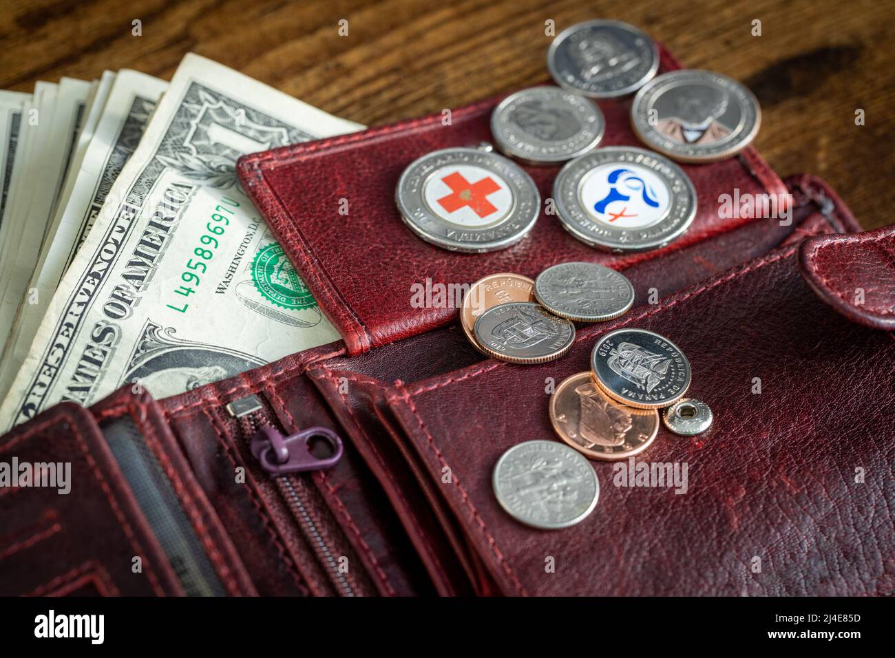 Panama money, Coins called Balboa and American banknotes sticking out ...