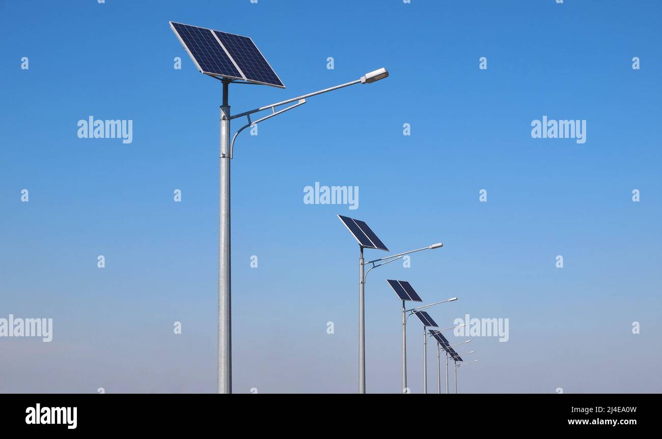 Street lighting pole with photovoltaic panel and LED lamp lights Stock ...