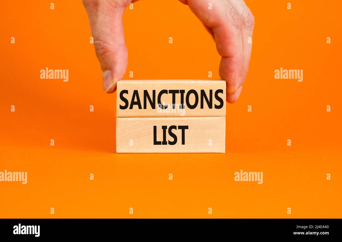 Sanctions list symbol. Wooden blocks with concept words Sanctions list ...