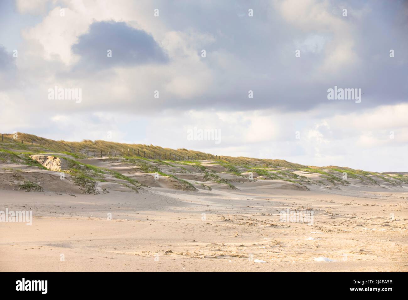 Coastal landscape Dutch North Sea coast during sunrise with old and new ...