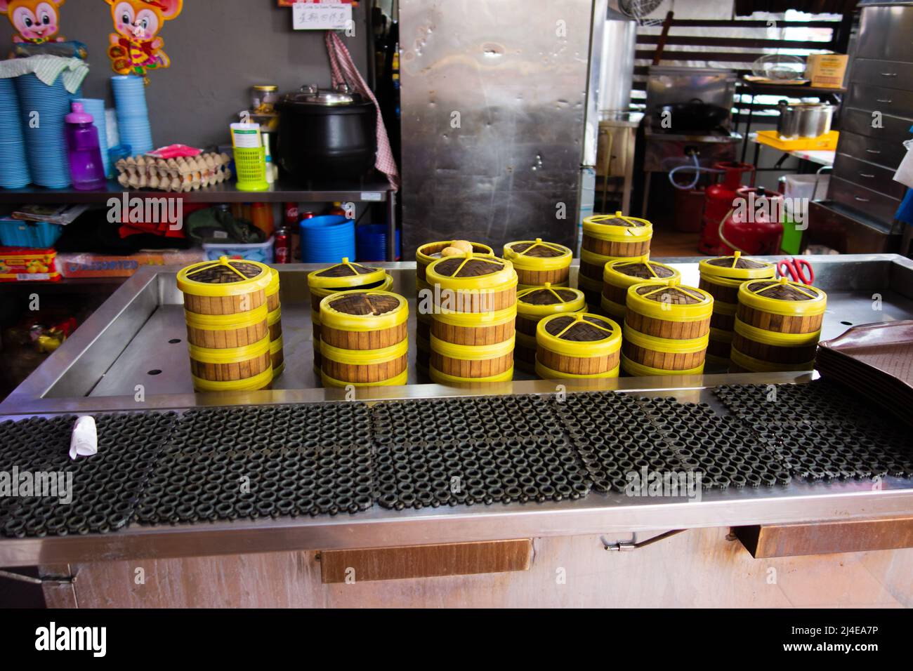 GEORGE TOWN, MALASIA – JANUARY 31, 2020 typical food court kitchen with ...