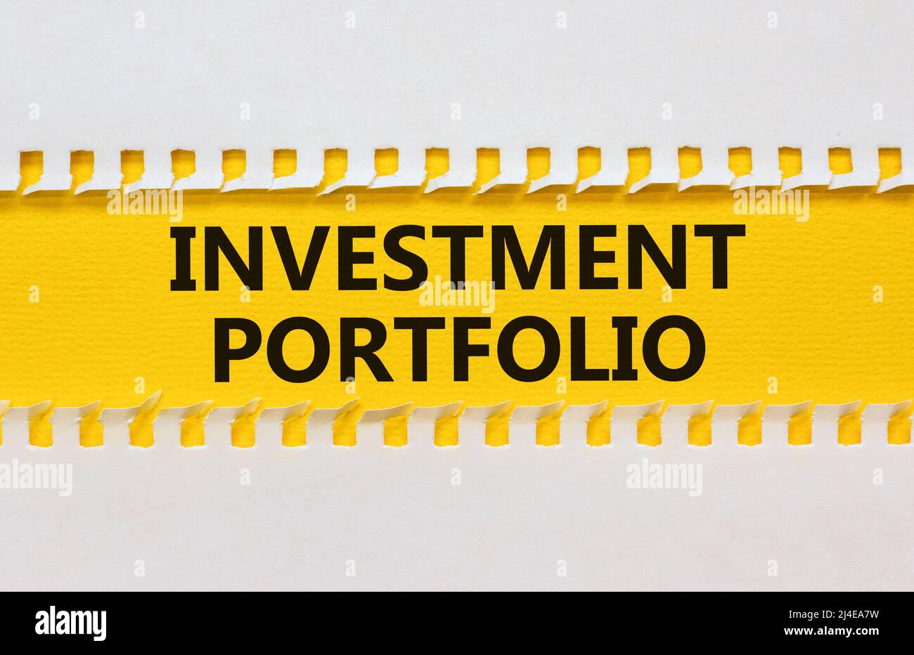 Investment portfolio symbol. Yellow and white paper with concept words ...