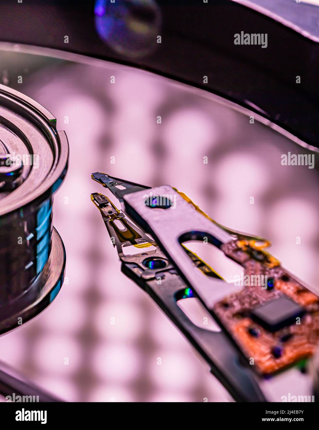 Macro Close up of inside of magnetic Hard Disc Drive with mirror ...