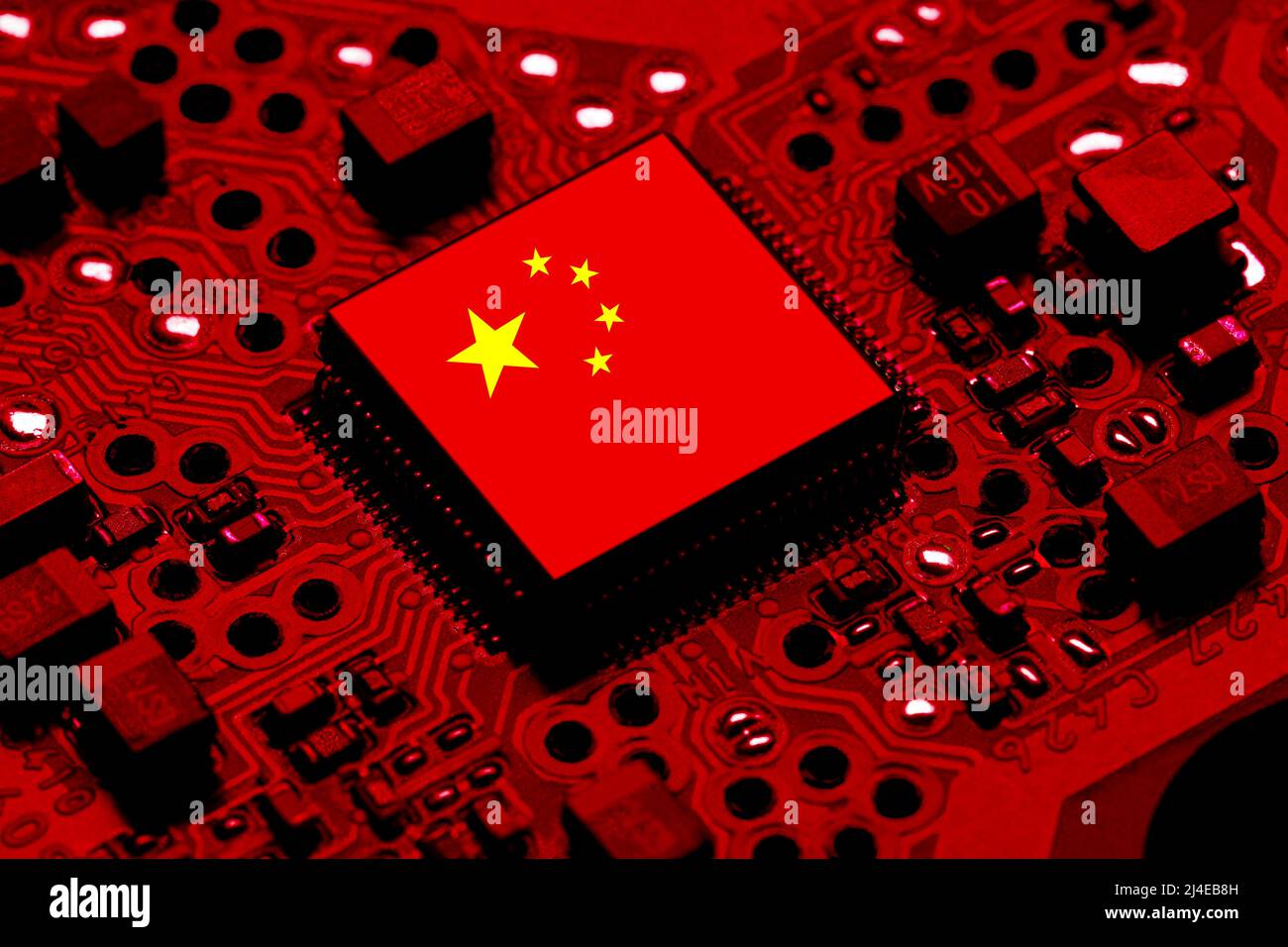 Chinese National Flag overlaid on PC micro chip on integrated circuit ...