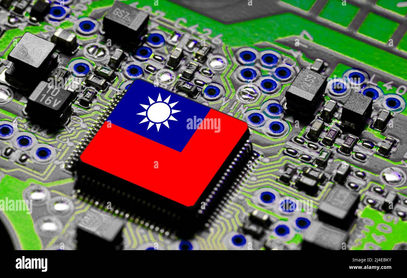 Taiwanese National Flag overlaid on PC micro chip on integrated circuit ...