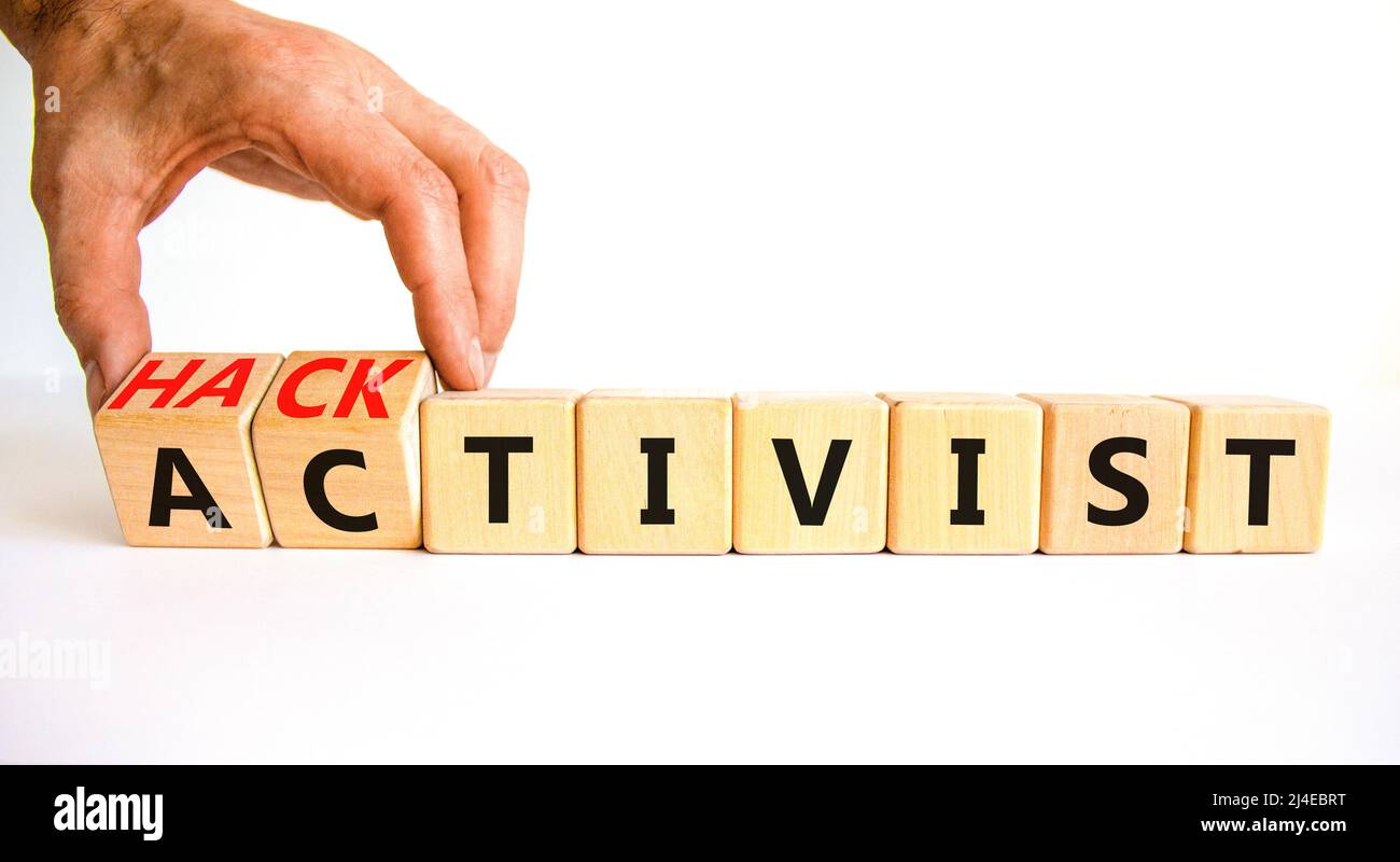 Activist or hacktivist symbol. Businessman turns wooden cubes and ...