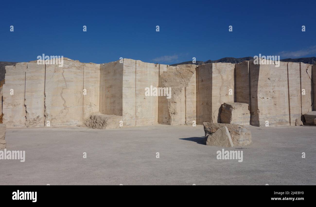 Old Marble Quarry in the North of Mexico. Wall of travertine marble in ...