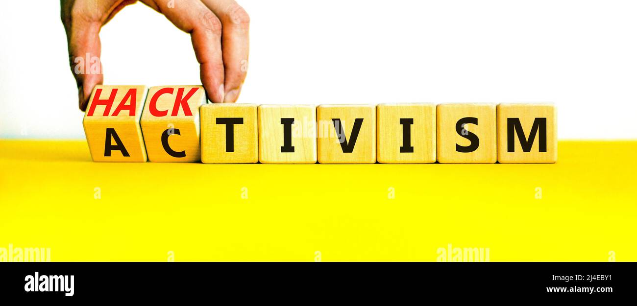Activism or hacktivism symbol. Businessman turns wooden cubes and ...
