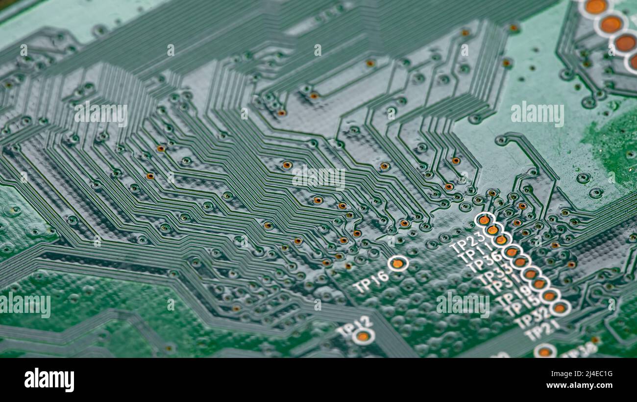Macro Close up of printed wiring on PC circuit board of modem router ...
