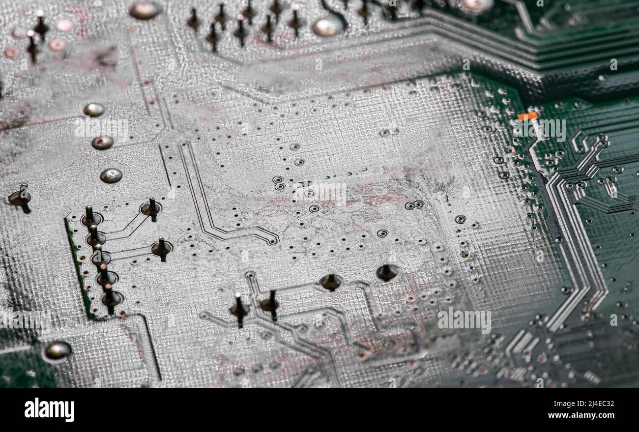 Macro Close up of printed wiring on PC circuit board of modem router ...