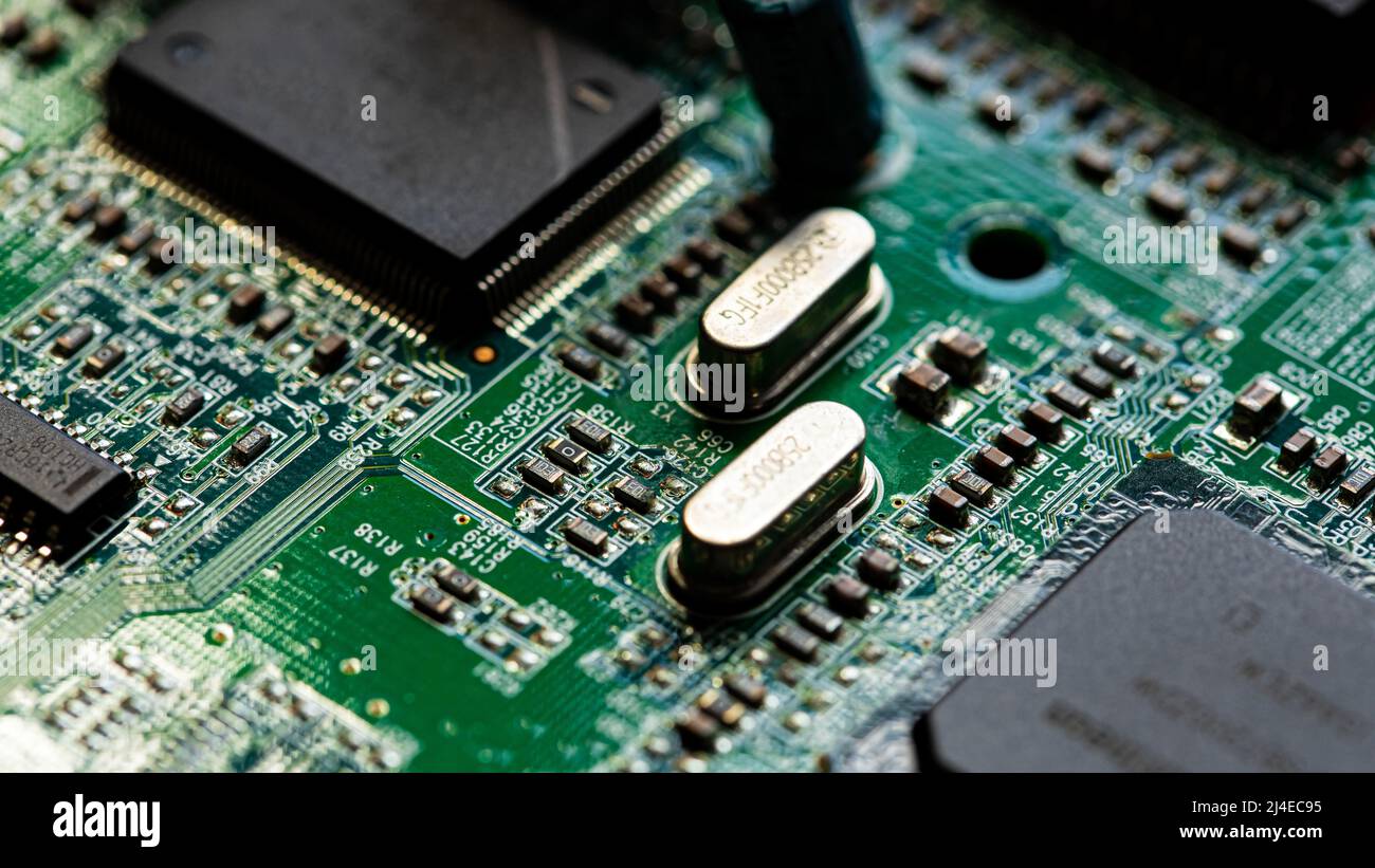 Macro Close up of components and microchips on PC circuit board of ...