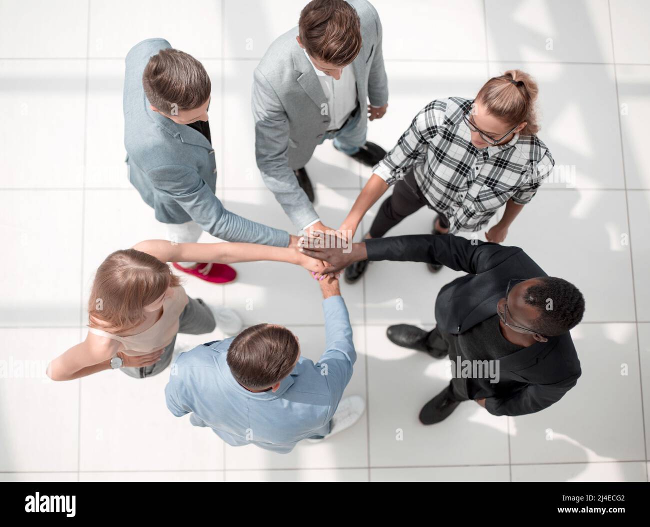 Concept of teamwork. Multiethic youth fun, emotional and rejoice folded ...