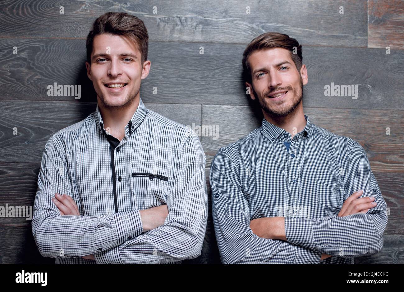 Two young mans isolated Stock Photo - Alamy