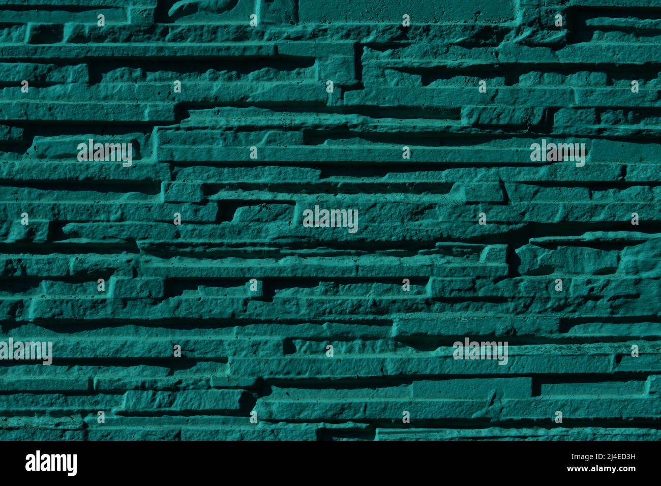 Teal or petrol narrow stone wall background texture Stock Photo - Alamy