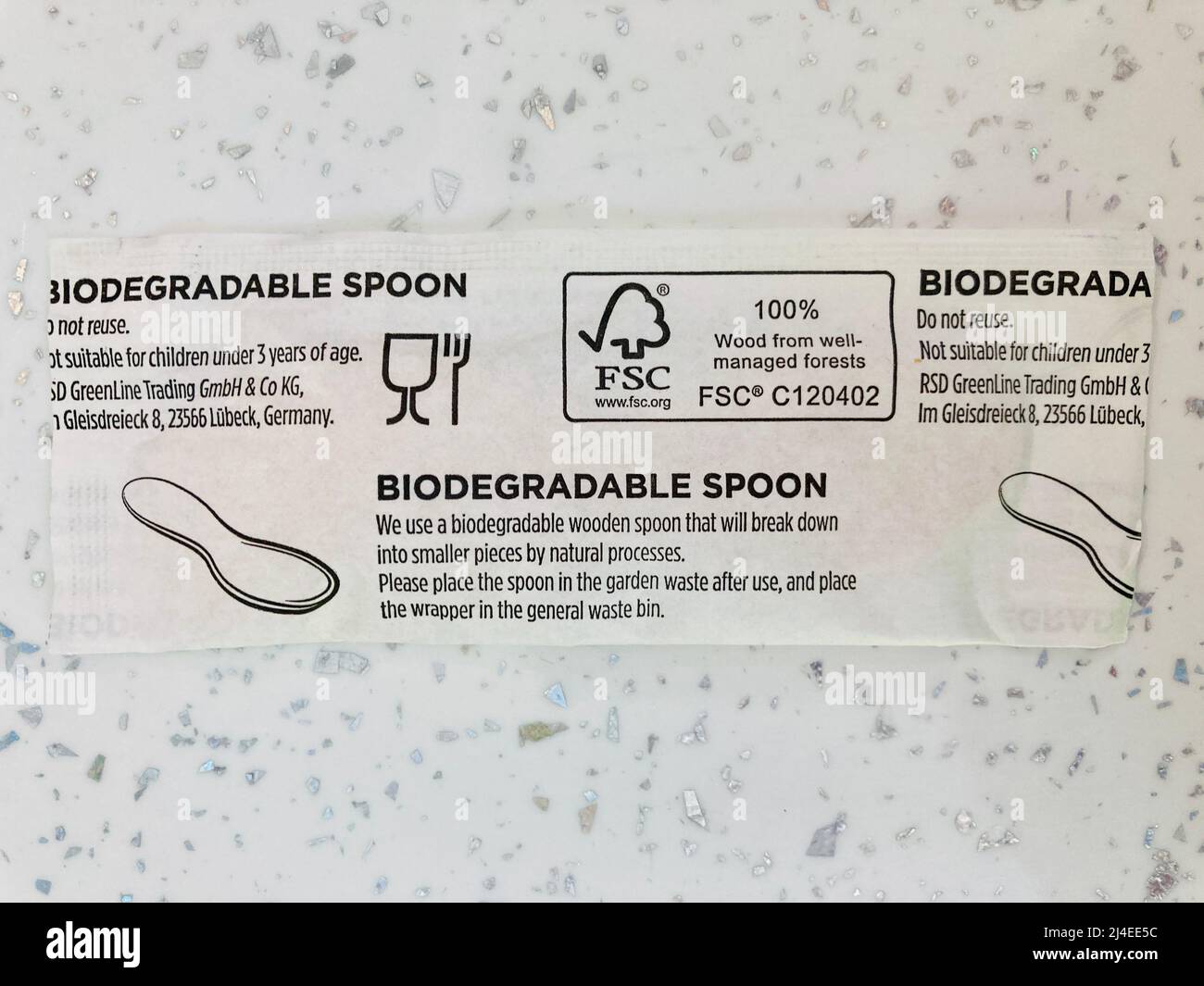 Biodegradable wooden spoon for sustainable waste disposal Stock Photo ...